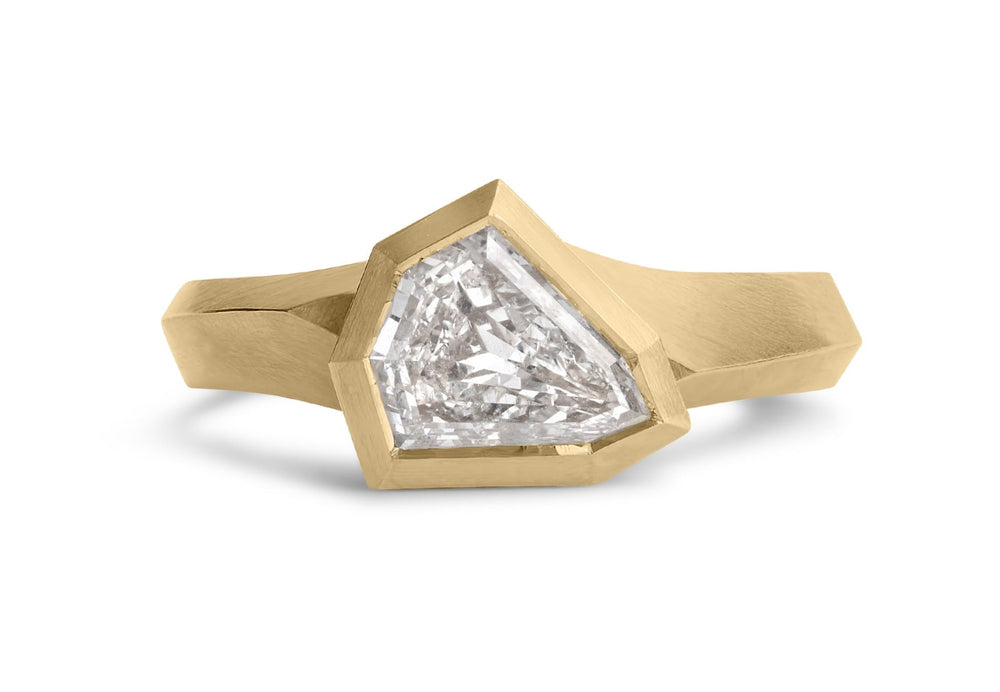 Aegis ring with shield shaped diamond