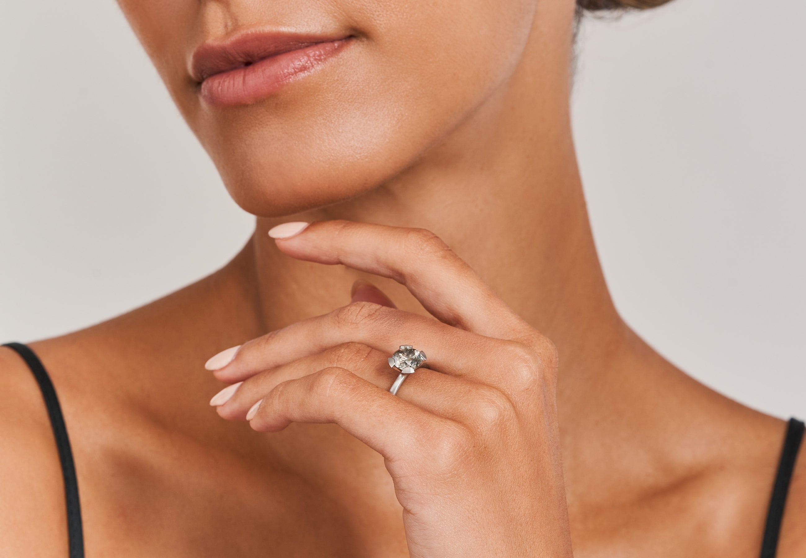 Platinum Calyx ring set with grey diamond