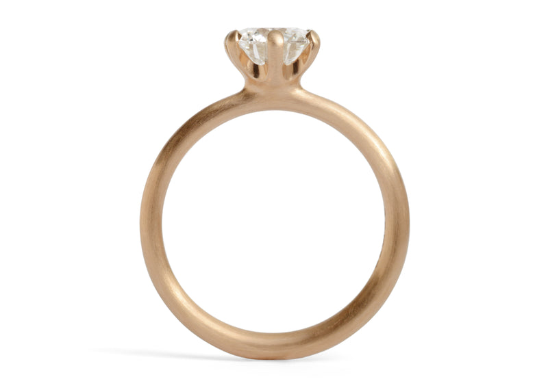 Sculpted rose gold six claw ring
