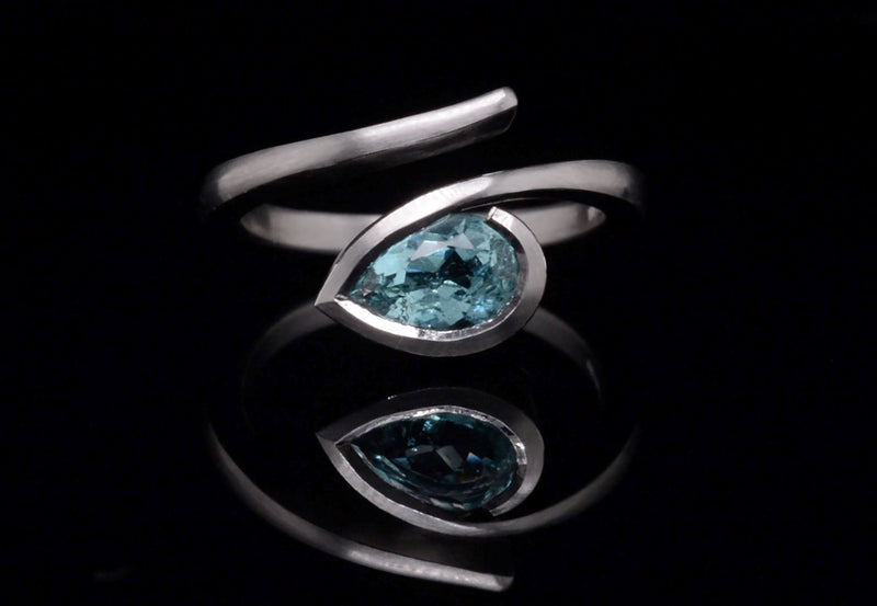 Hand forged platinum and pear shaped paraiba ring – McCaul
